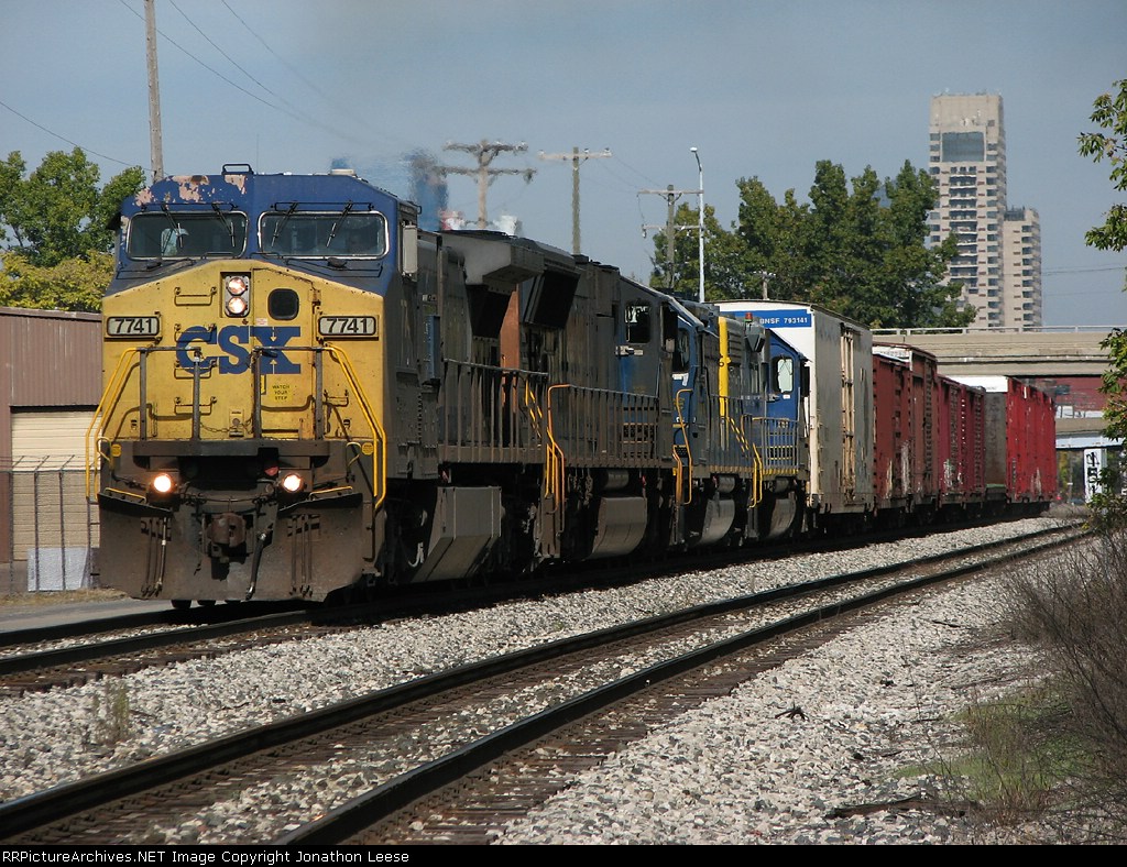 CSX 7741 leads Q326 east through the double track